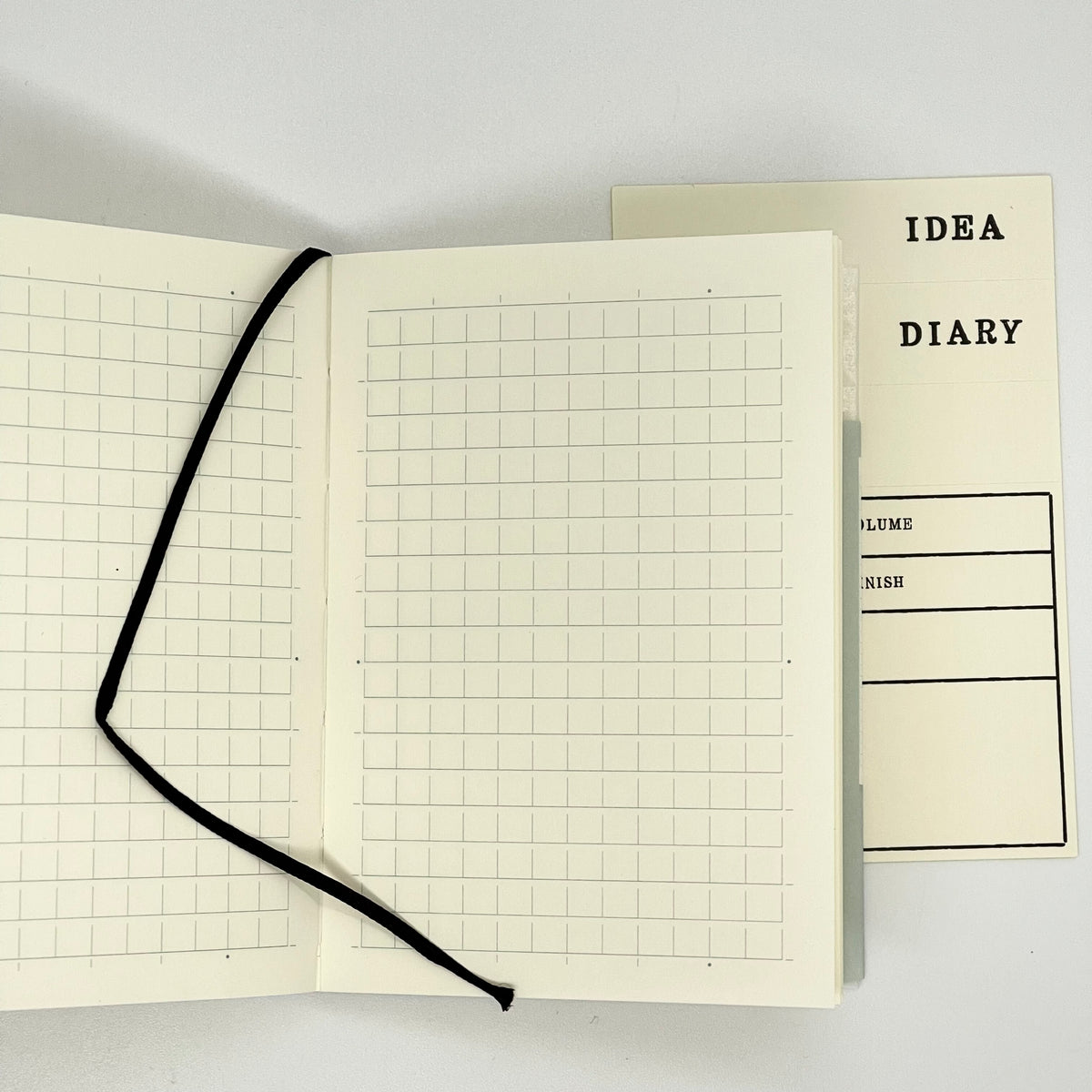 Midori MD Notebook A7 Grid – Reid Stationers